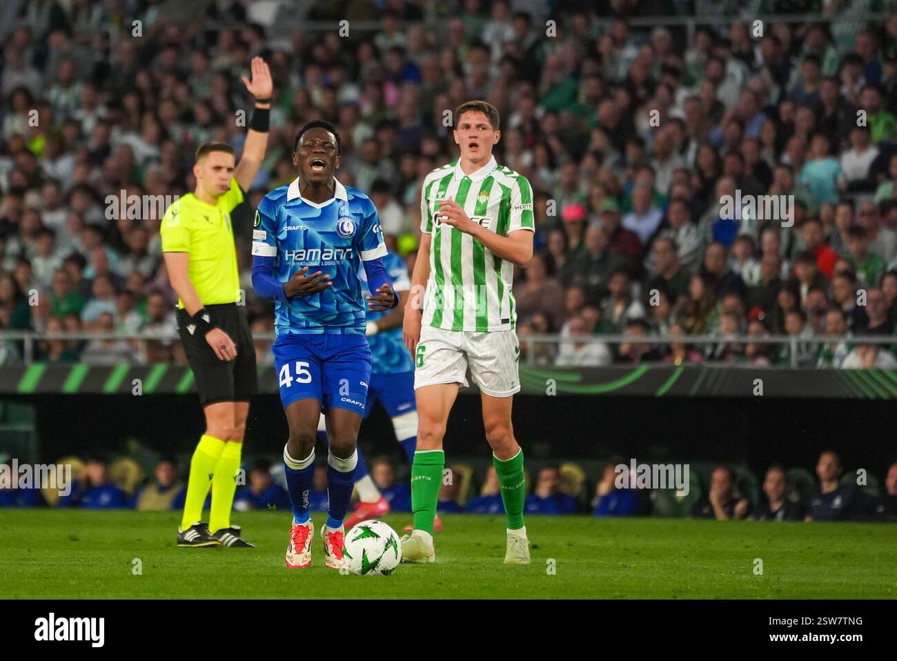 Sevilla, Spain. 20th Feb, 2025. Gent's Hyllarion Goore and Betis' Natan ...