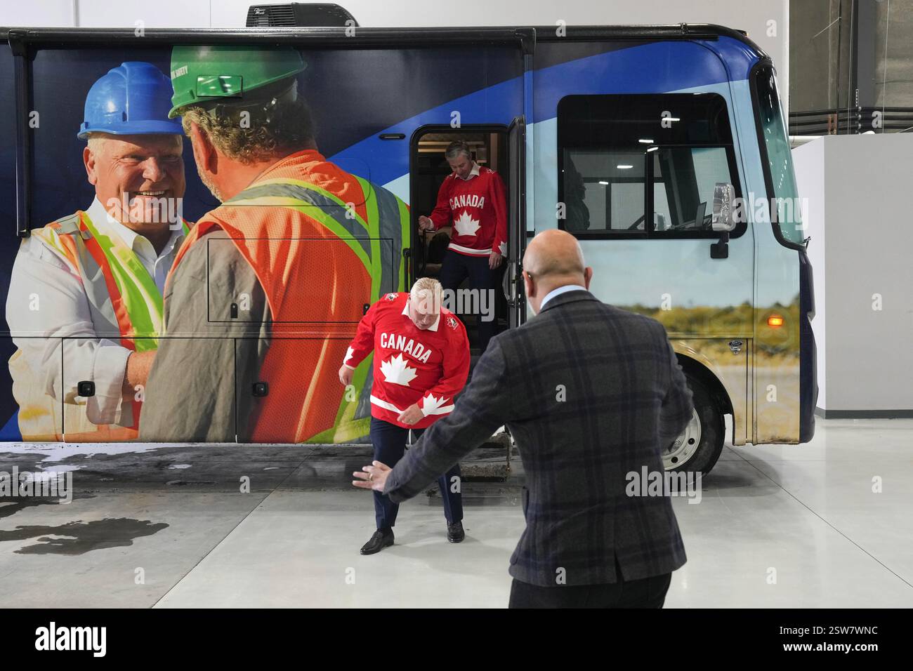 Milton, Can. 20th Feb, 2025. Ontario PC Leader Doug Ford slips on a wet ...