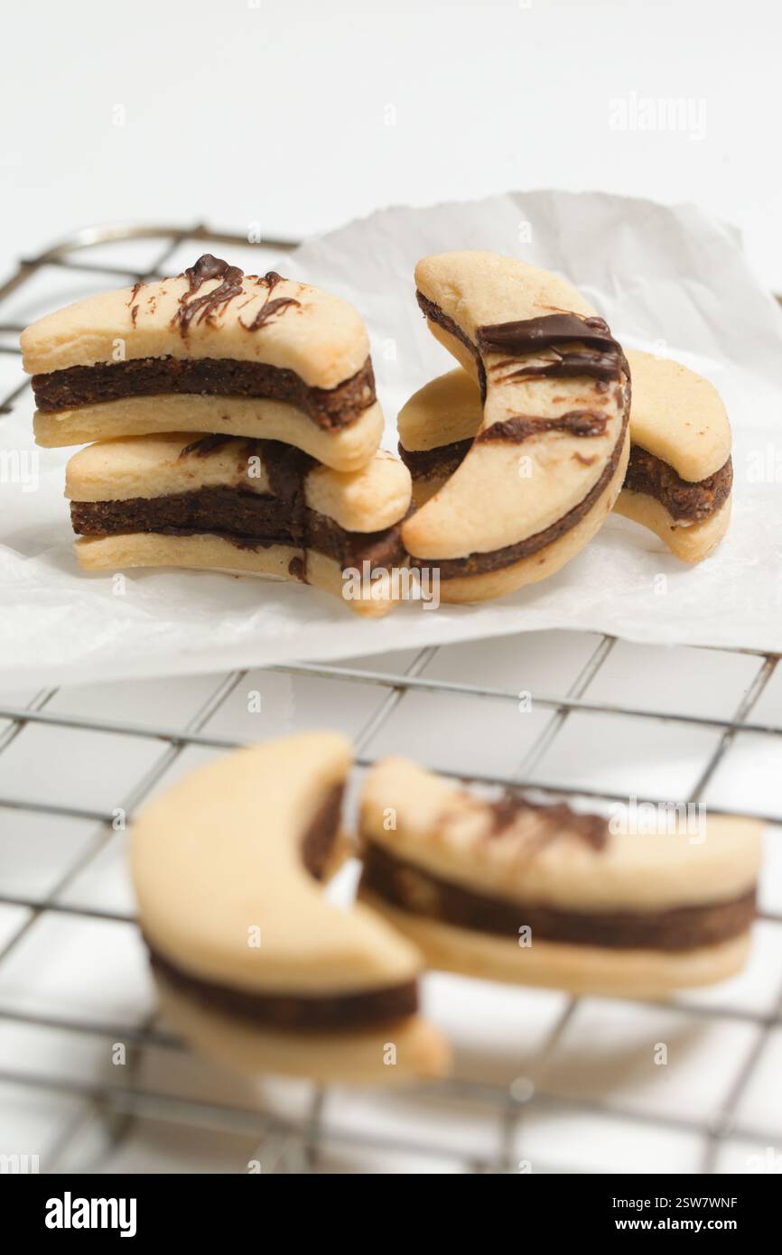 Crunchy crescent moon cookies with cocoa filling Stock Photo - Alamy