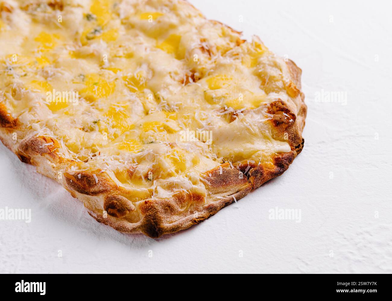 Delicious cheesy flatbread on white background Stock Photo - Alamy