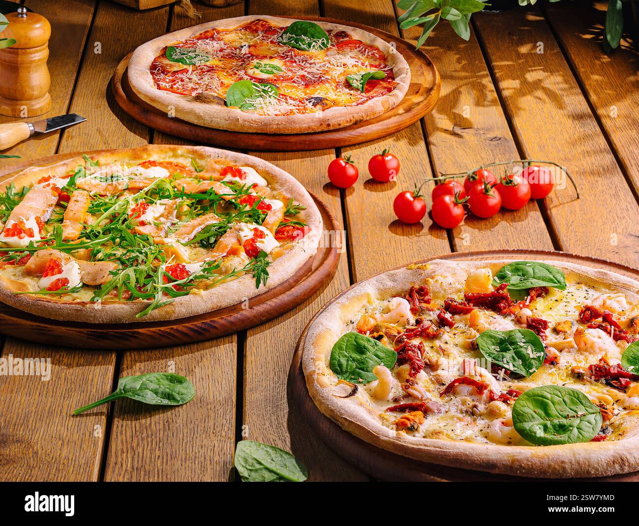 Artisanal pizzas with fresh toppings top view hi-res stock photography ...