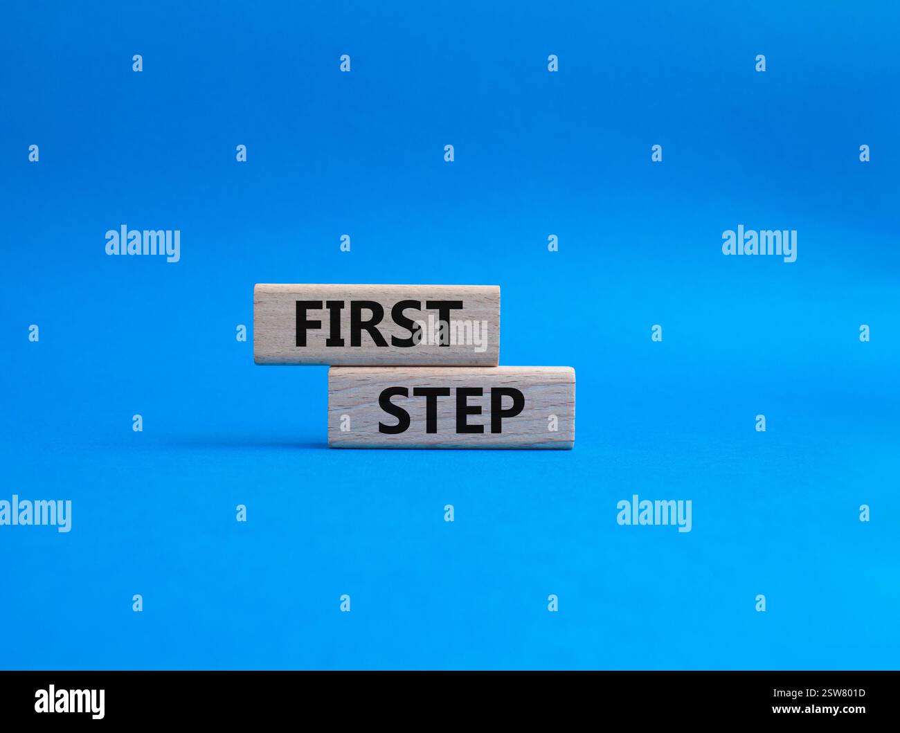 First step symbol. Wooden blocks with words 'First step'. Beautiful ...