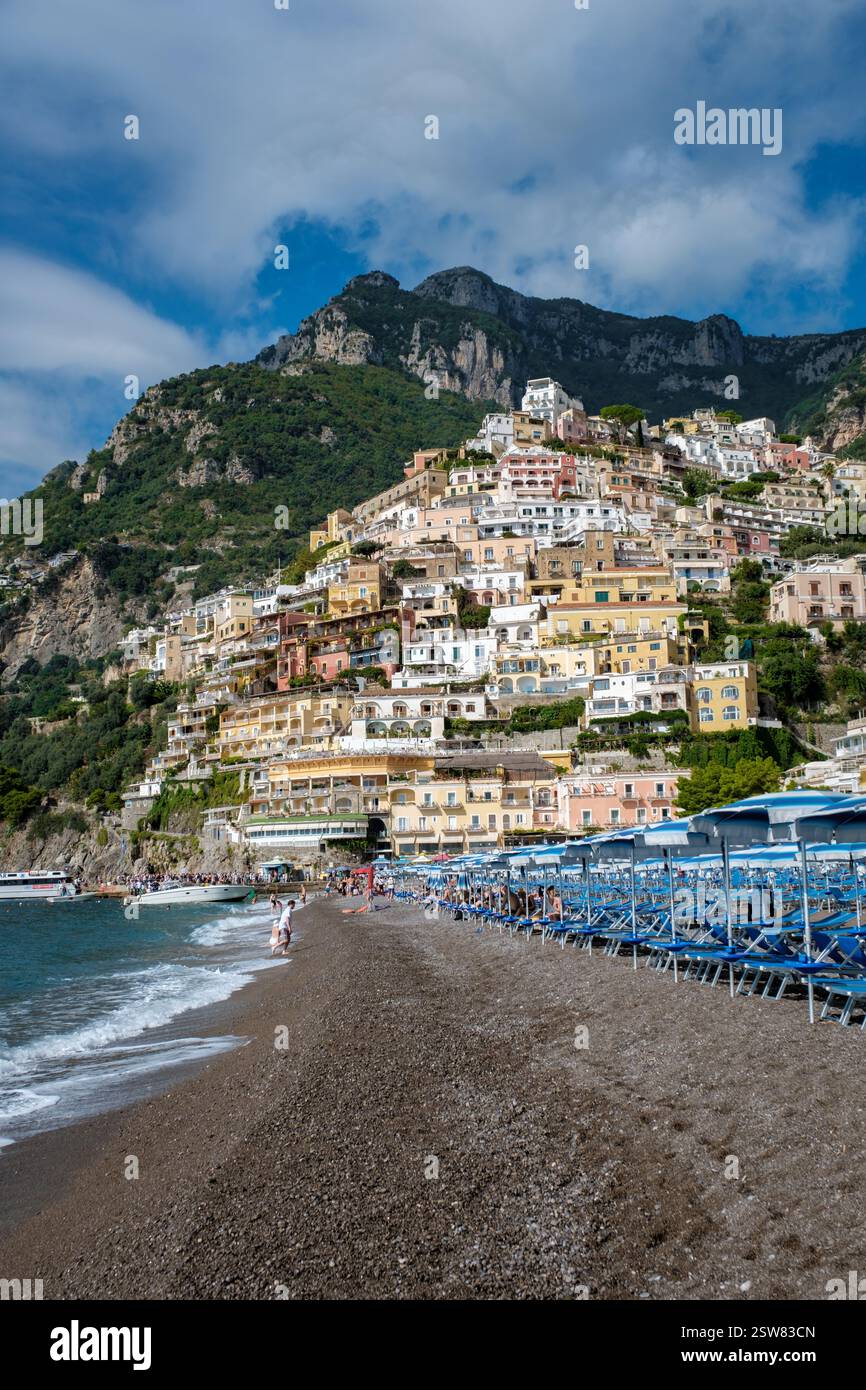 Vibrant Positano beach under the dramatic cliffs of Italy's Amalfi ...
