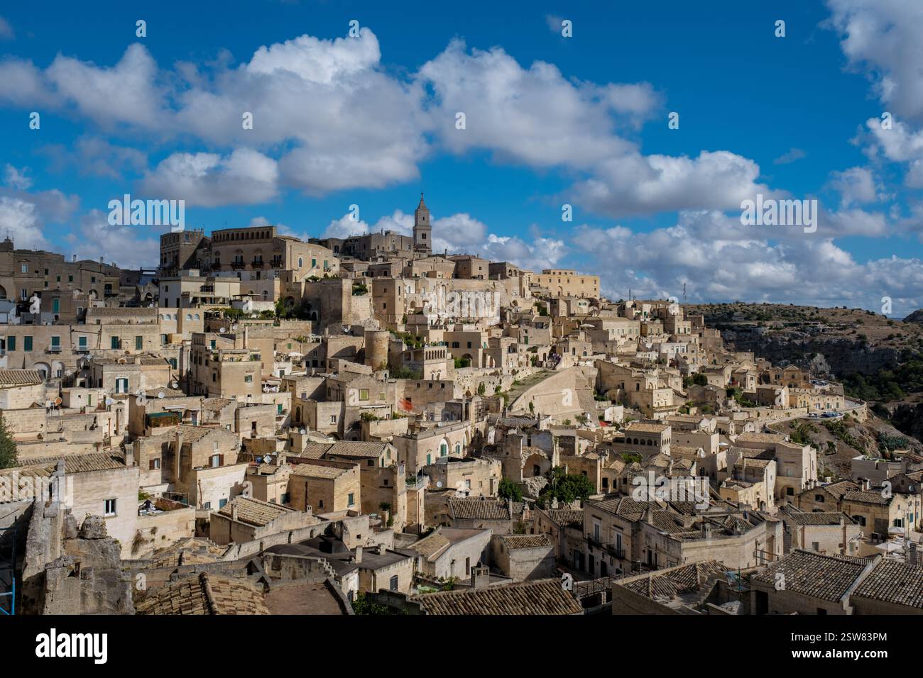 Explore the stunning ancient landscape of Matera, Puglia, Italy under a ...