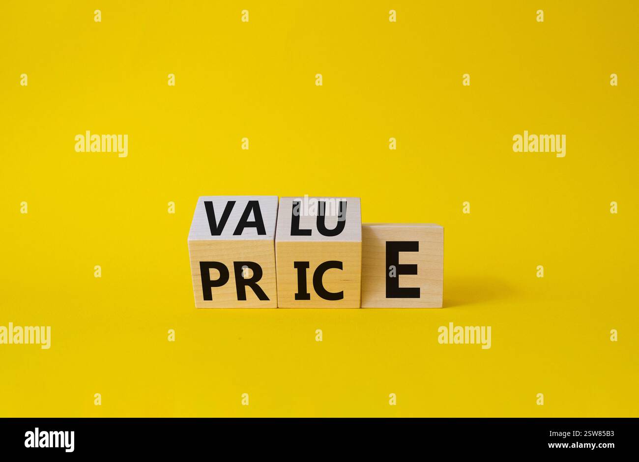 Value and Price symbol. Wooden cubes with words Price and Value ...
