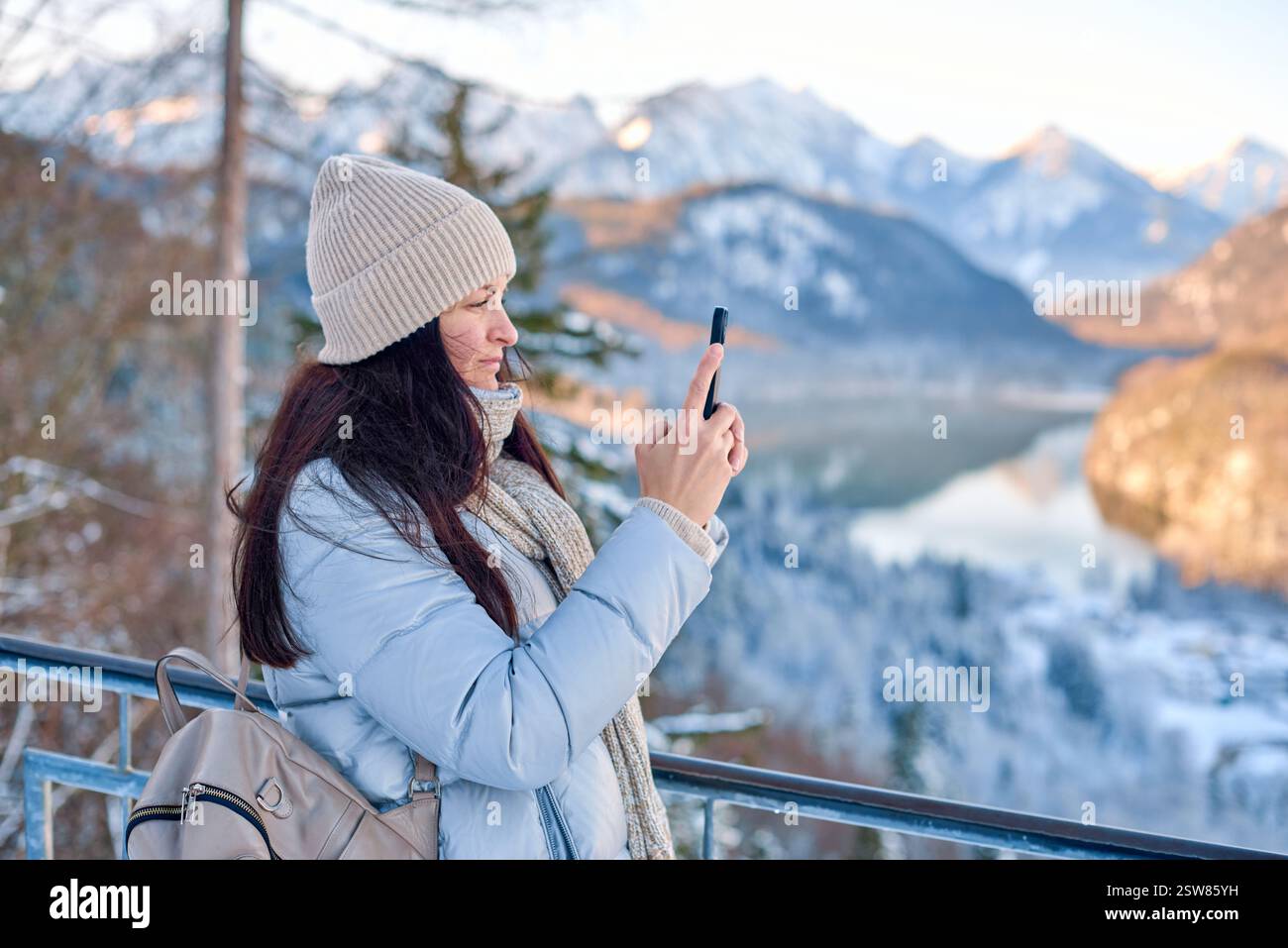 This high-resolution photograph captures a young woman standing ...