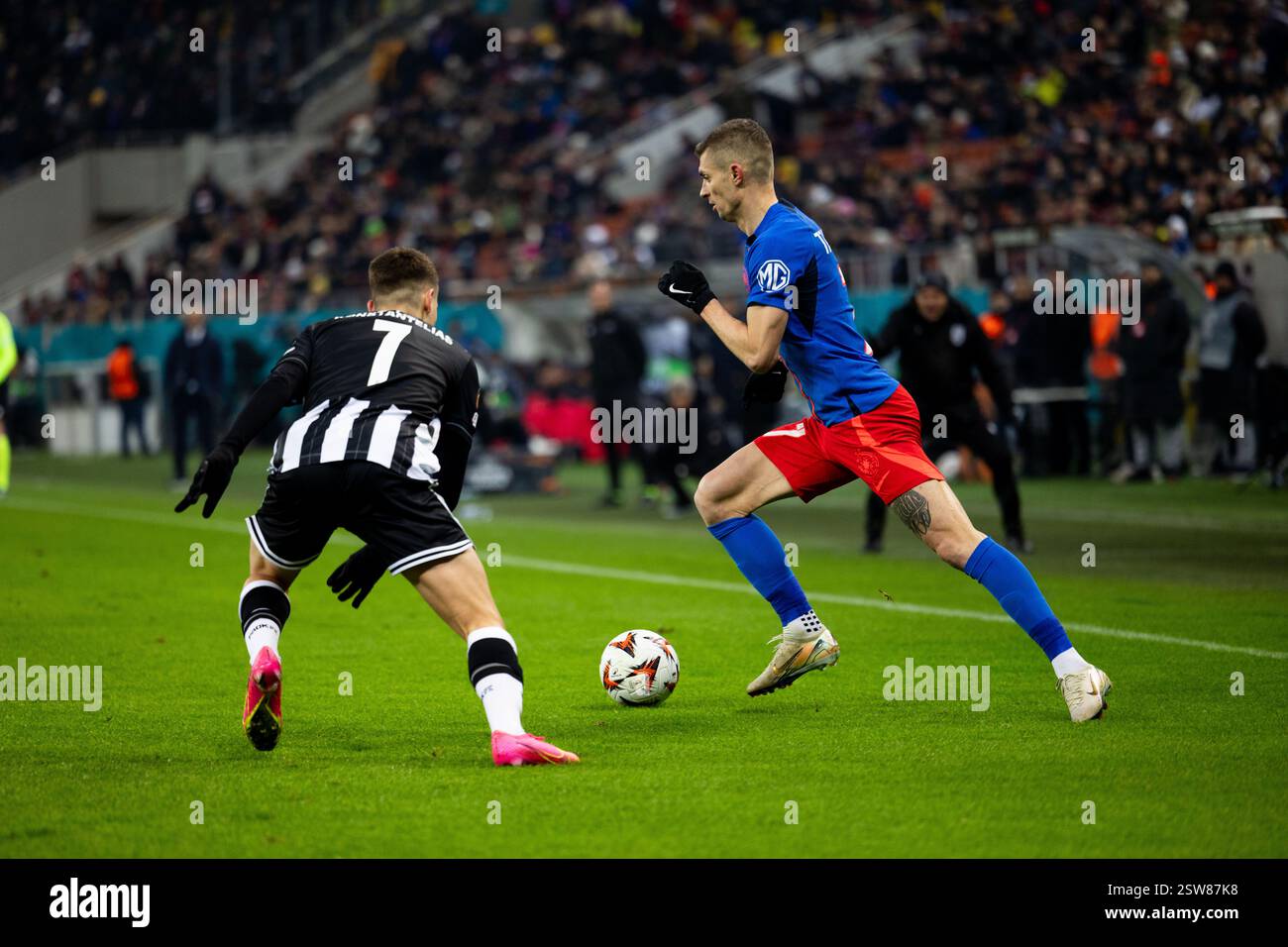 Bucharest, Roumanie. 30th Jan, 2025. Florin Tanase of FCSB and Giannis ...