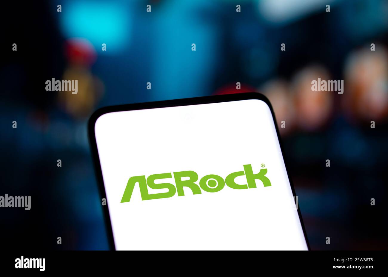 Dhaka, Bangladesh- 23 Oct 2024: Asrock logo is displayed on smartphone ...