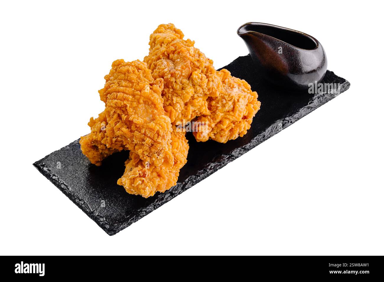 Fried chicken wings with dipping sauce on black stone plate Stock Photo ...