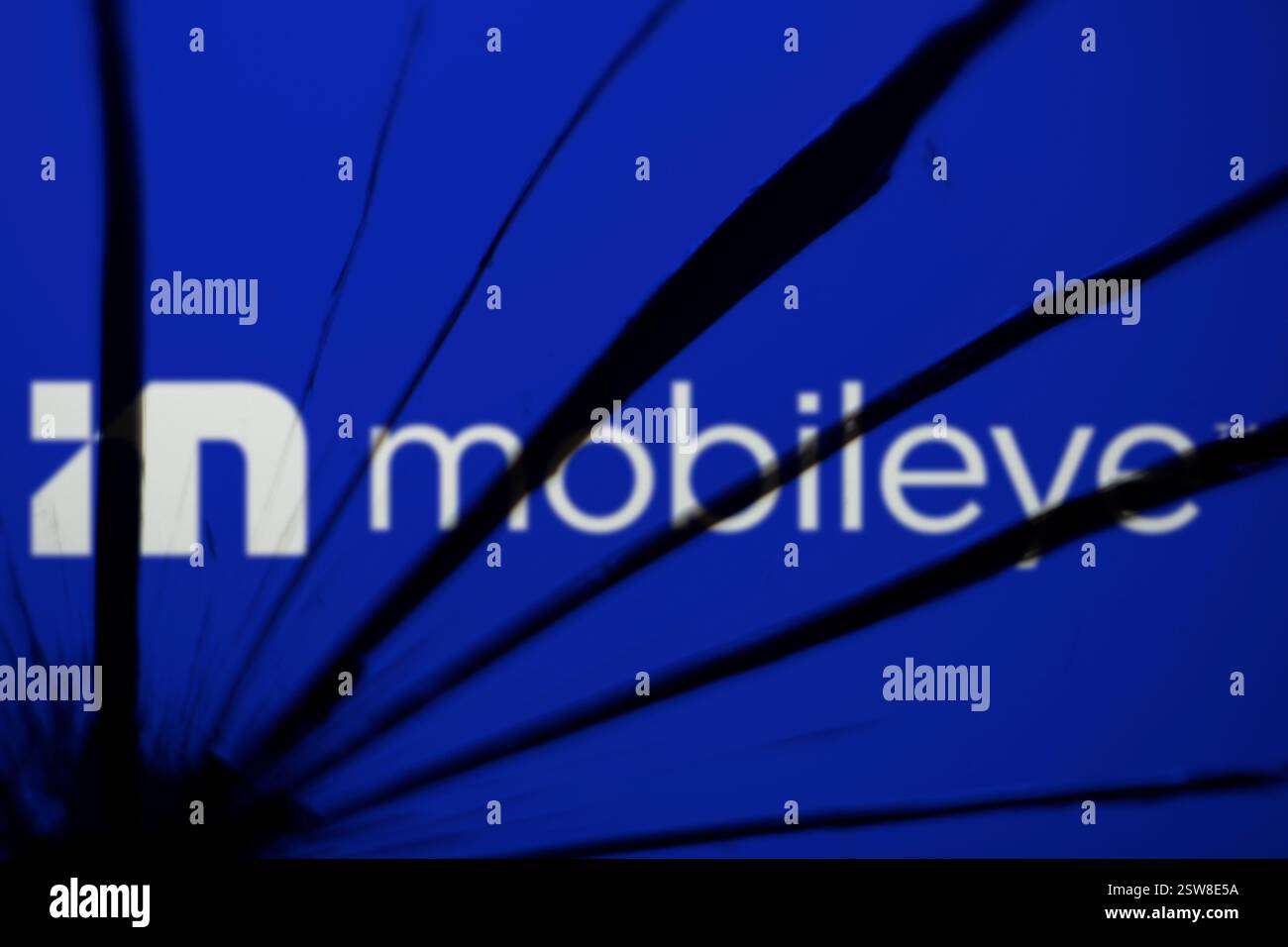 Dhaka, Bangladesh- 24 Oct 2024: Mobileye logo is visible on the broken ...