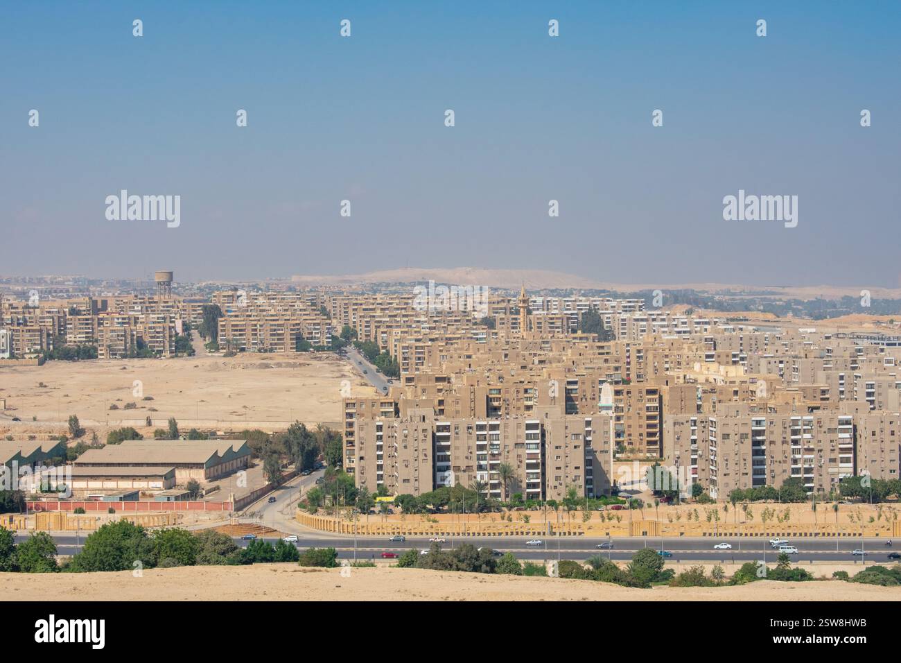 View on slum in Old Cairo, Egypt. Smog above City Stock Photo - Alamy