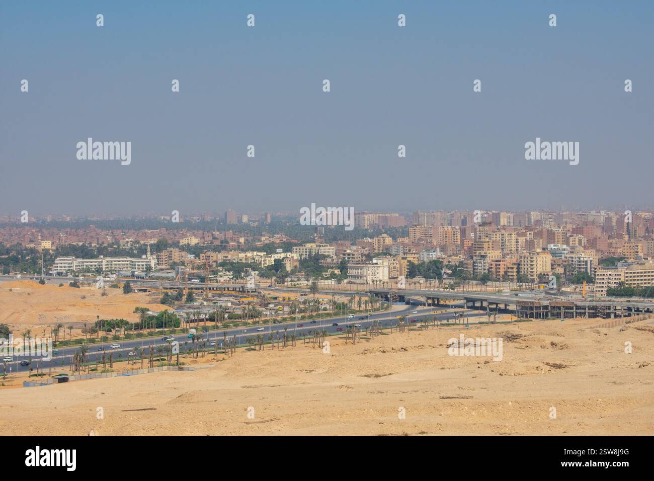 View on slum in Old Cairo, Egypt. Smog above City Stock Photo - Alamy