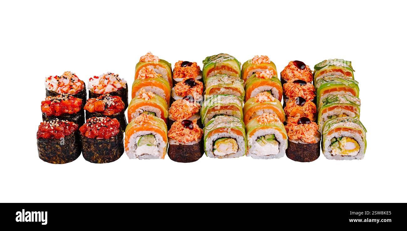 Different types of sushi rolls are lying in a row on a white background ...