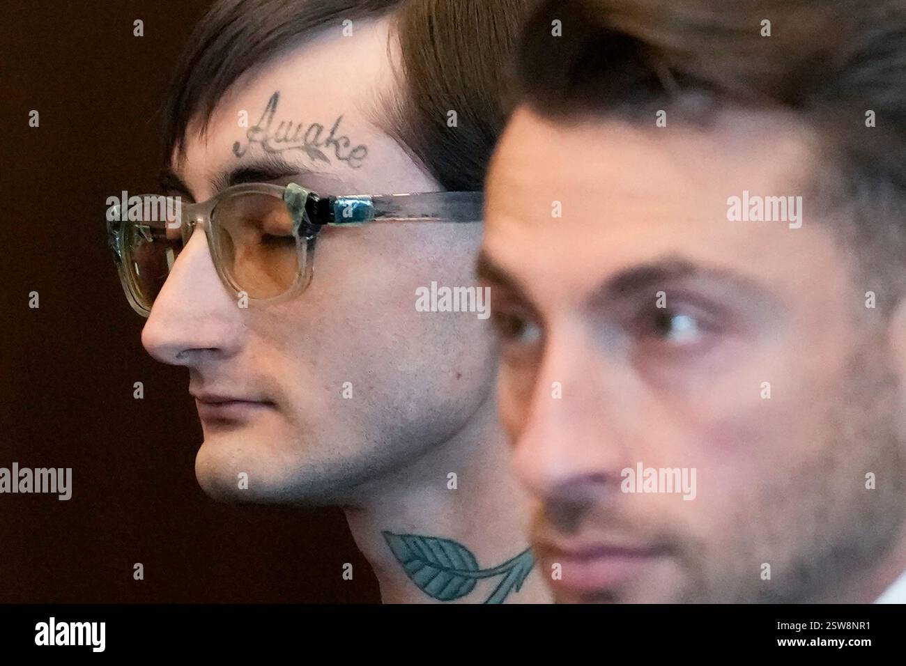 Robert E. Crimo III., left, listens to Judge Victoria A. Rossetti ...