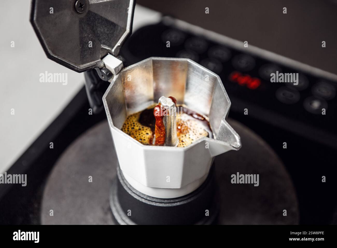 Brewing Coffee in Moka Pot on Stove, Showcasing the Boiling Process Up ...