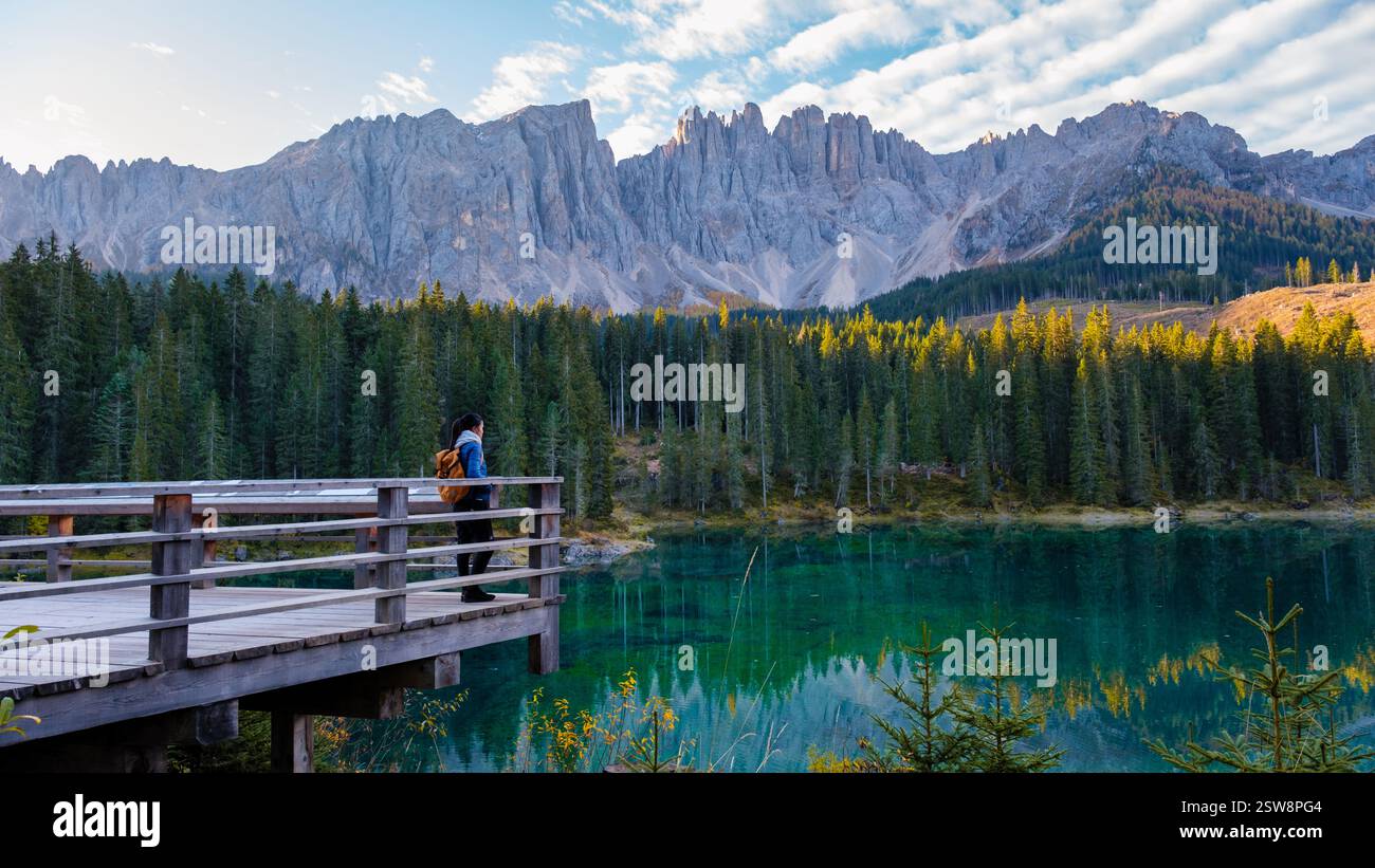 Exploring tranquil waters and towering peaks in the Dolomites, Italy at ...
