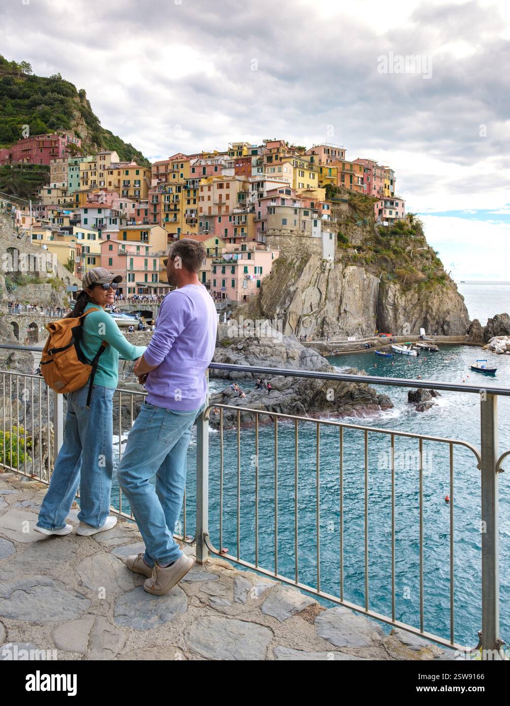 Exploring the stunning coastline of Cinque Terre in Italy with vibrant ...