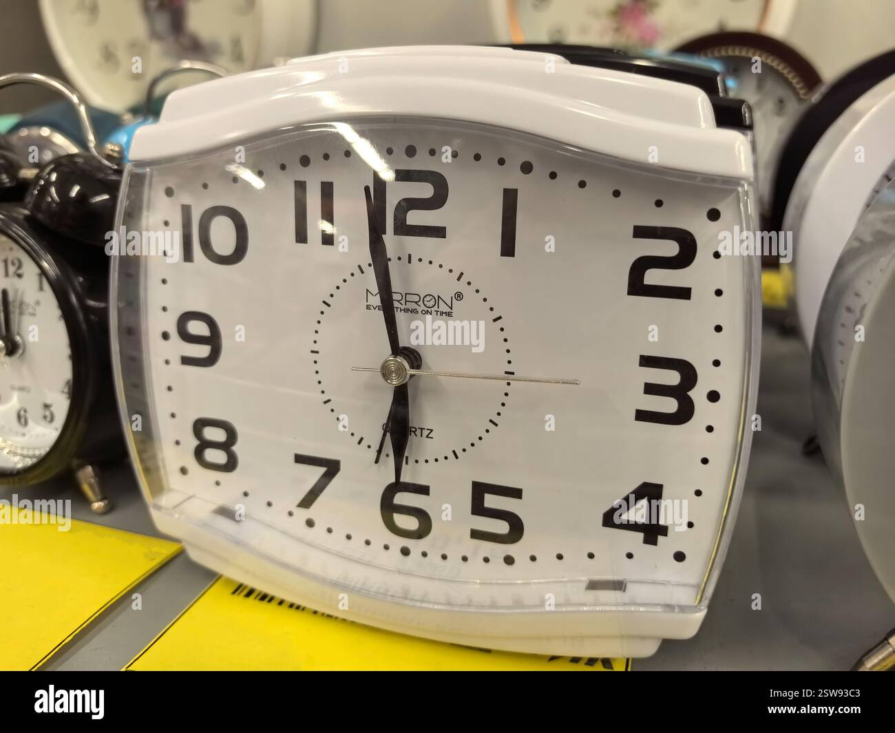 Bobruisk, Belarus - 10 February 2025: A classic clock featuring a clear ...