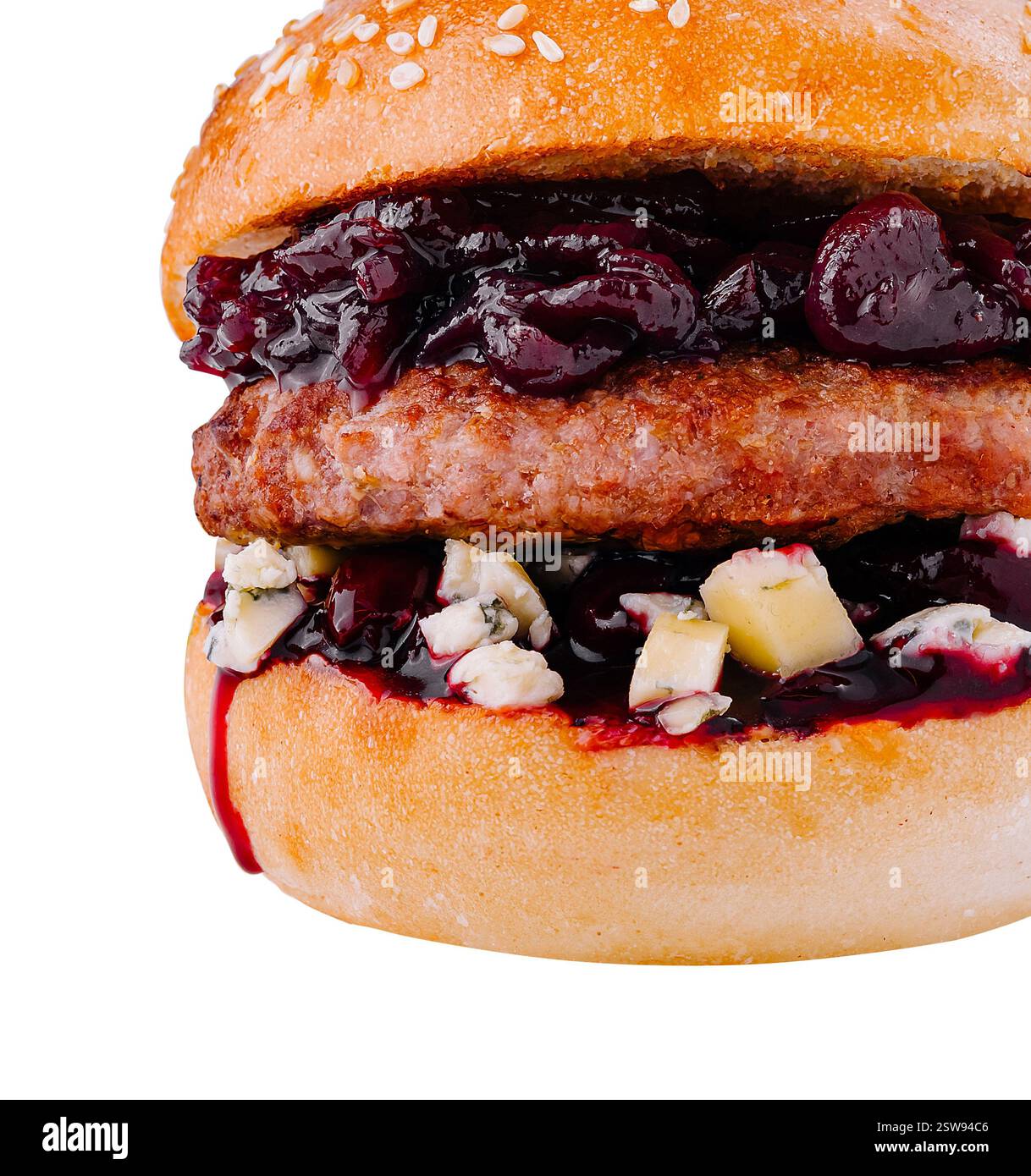 Delicious burger with blue cheese and cherry sauce standing on white ...