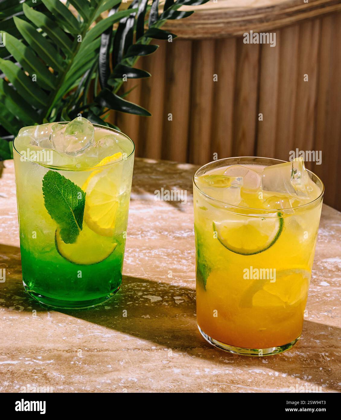 Two colorful cocktails with ice cubes hi-res stock photography and ...
