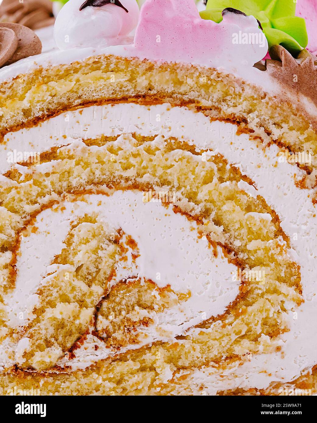 Delicious swirl cake detail showing layers of cream filling Stock Photo ...