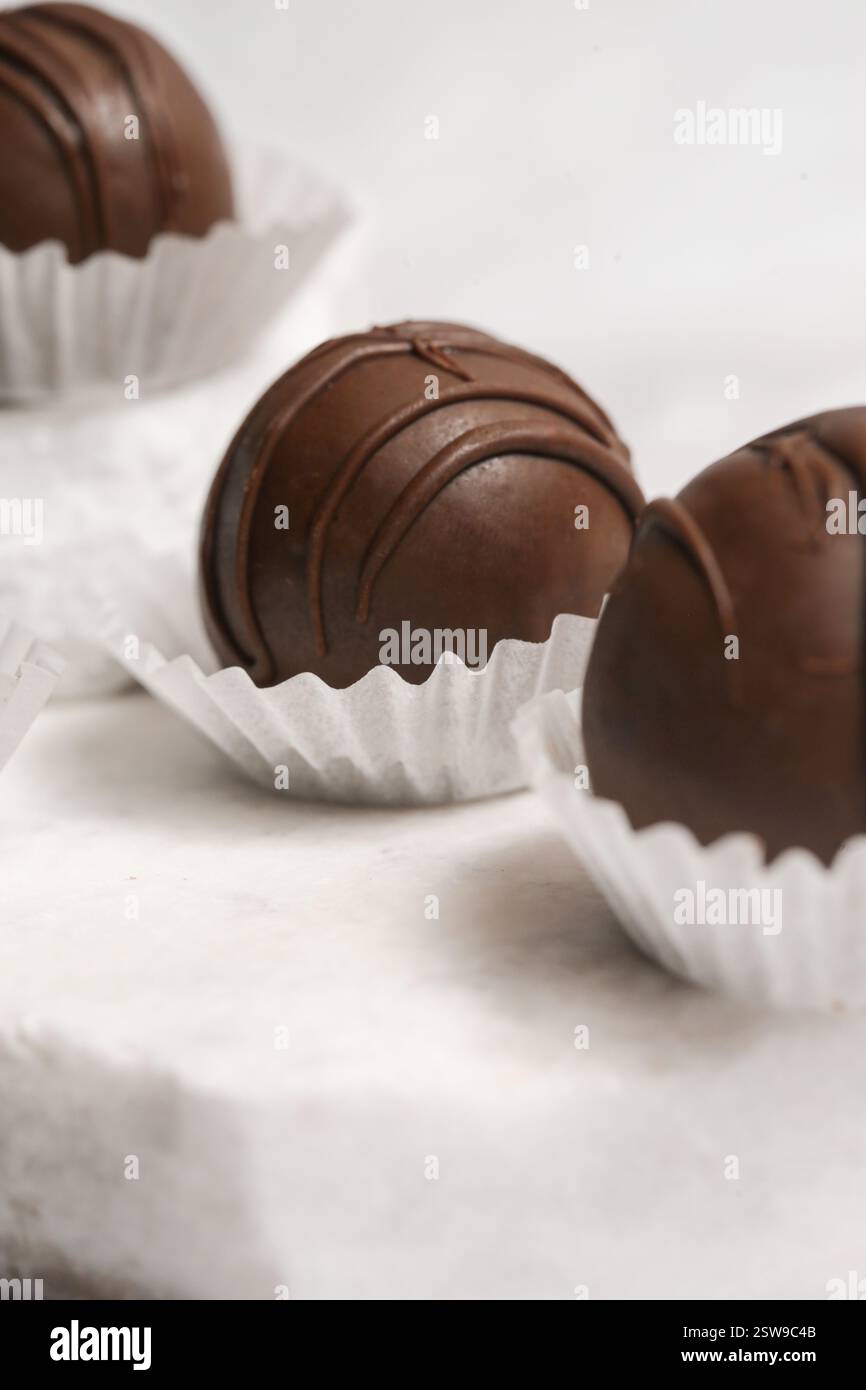 Classic chocolate truffles coated in dark chocolate Classic chocolate ...