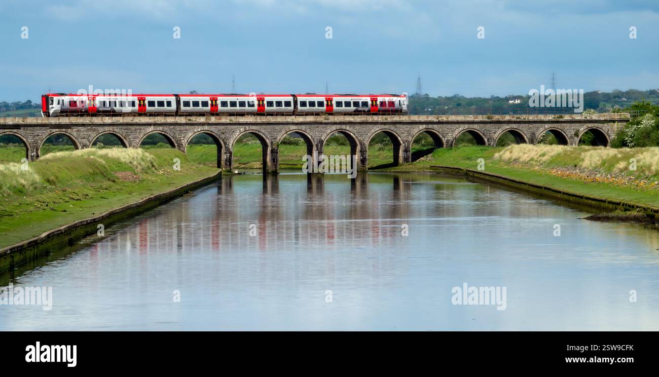 TfW Train travelling along Malltraeth Viaduct, Anglesey Stock Photo - Alamy