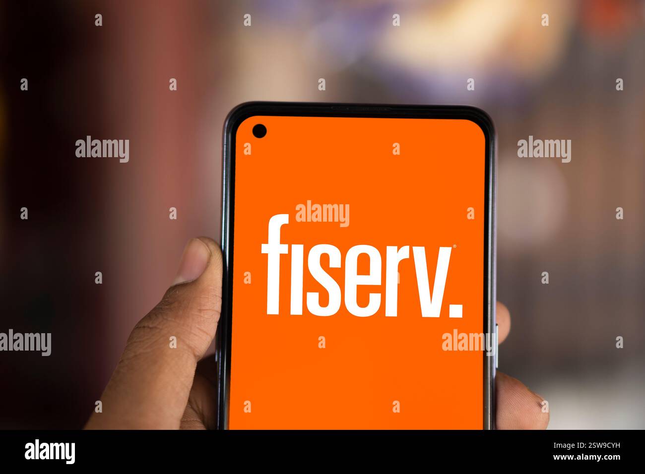 Dhaka, Bangladesh- 31 Oct 2024: Fiserv logo is displayed on smartphone ...
