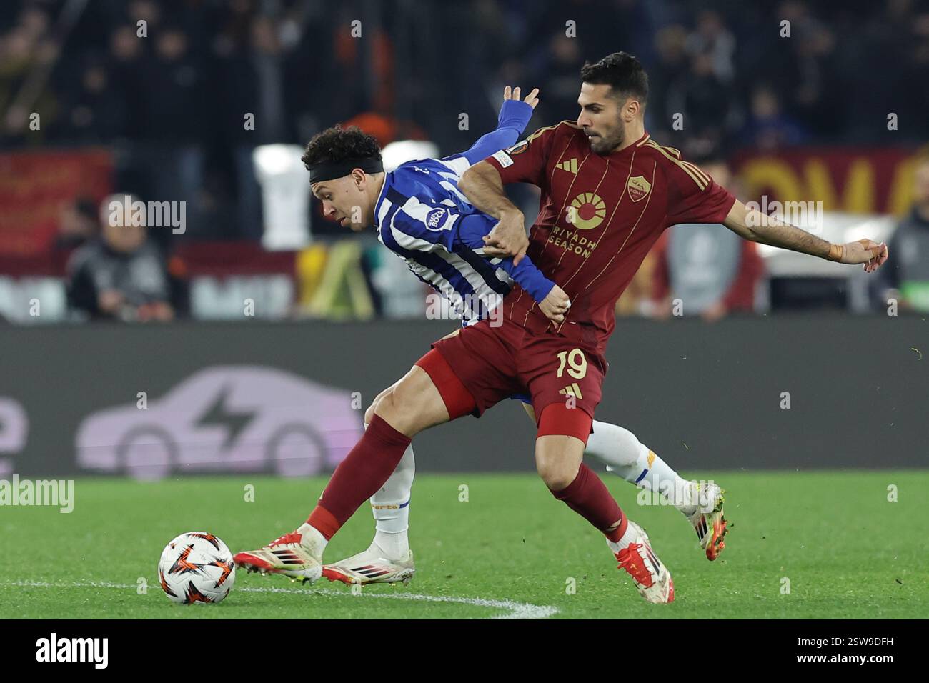 Porto’s Brazilian forward Pepe challenges for the ball with Roma’s ...