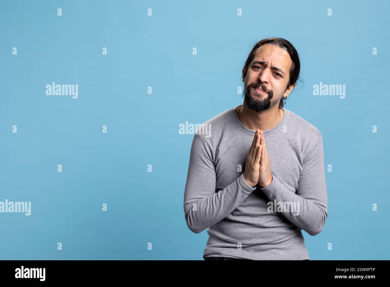 Spiritual adult showing belief and faith in Jesus Christ asking for ...