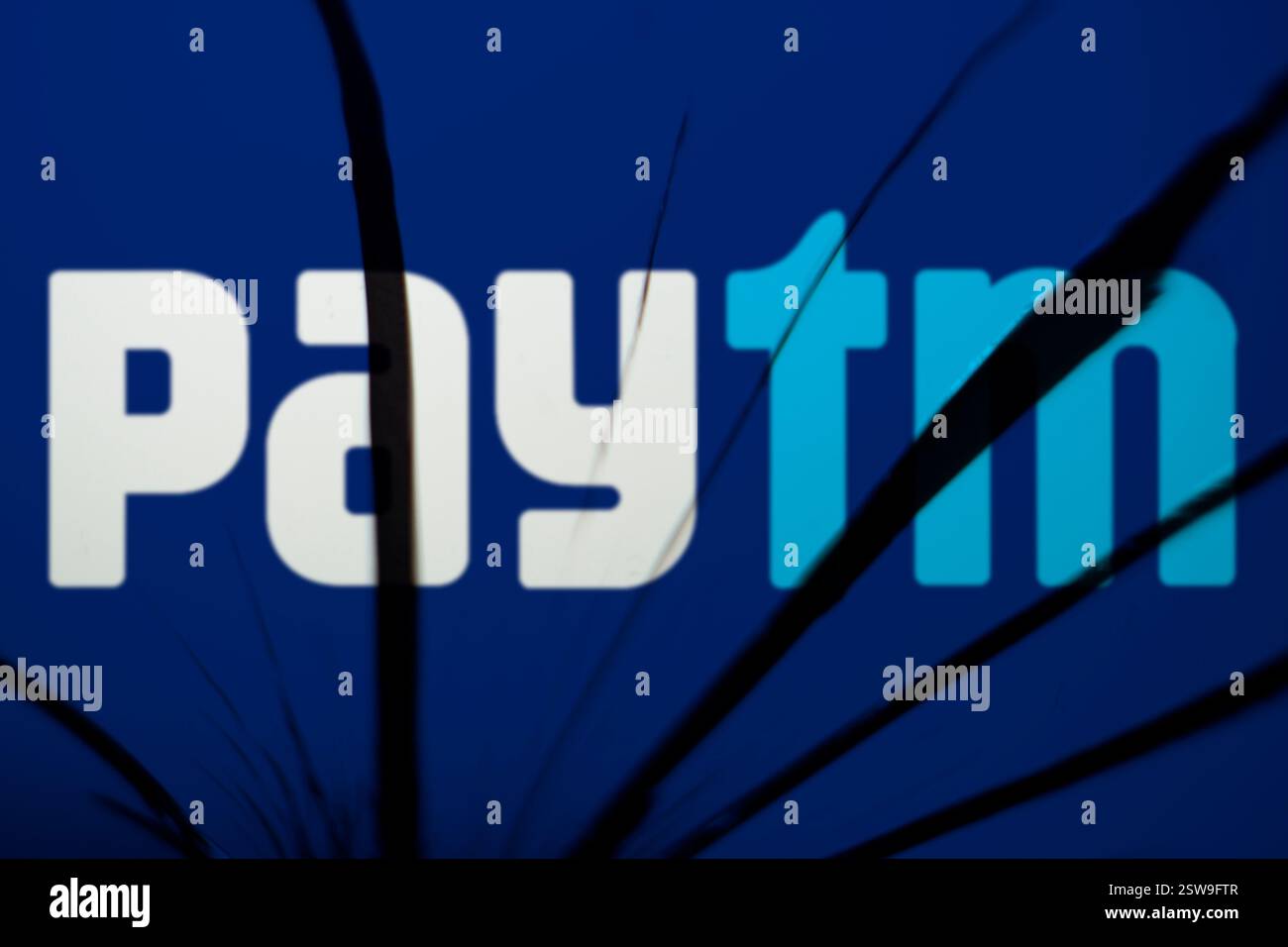 Paytm logo is visible on the broken glass hi-res stock photography and images - Alamy