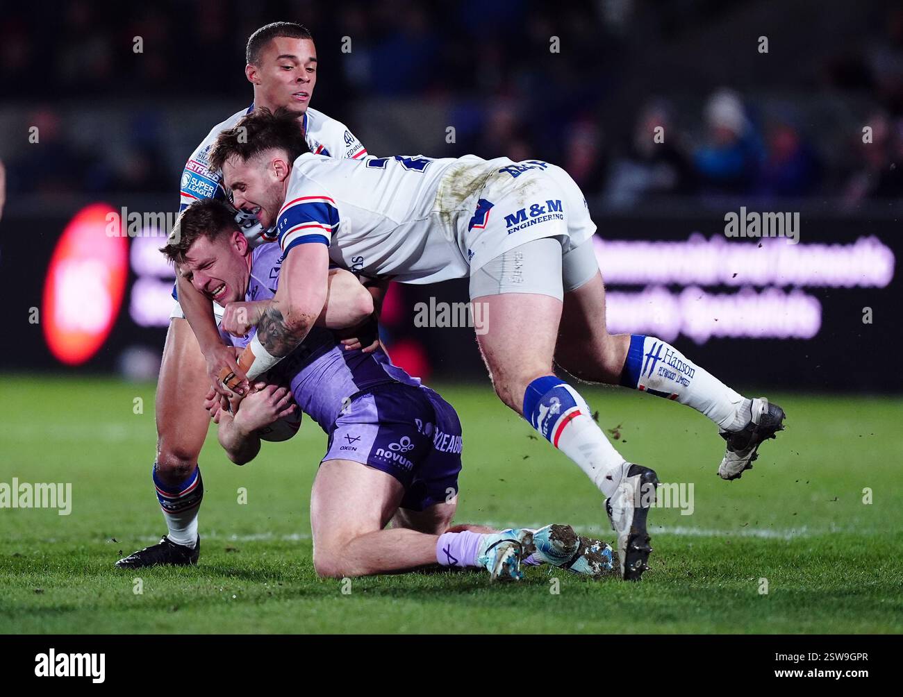 Wakefield Trinity's Jack Croft tackles Hull Kingston Rovers' Tom Davies ...