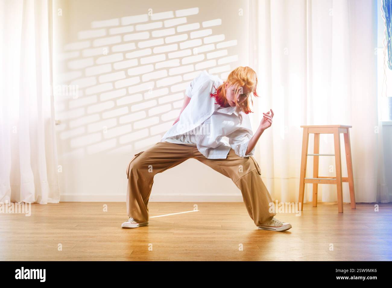 Dynamic dance performance showcasing expressive movement in a studio ...