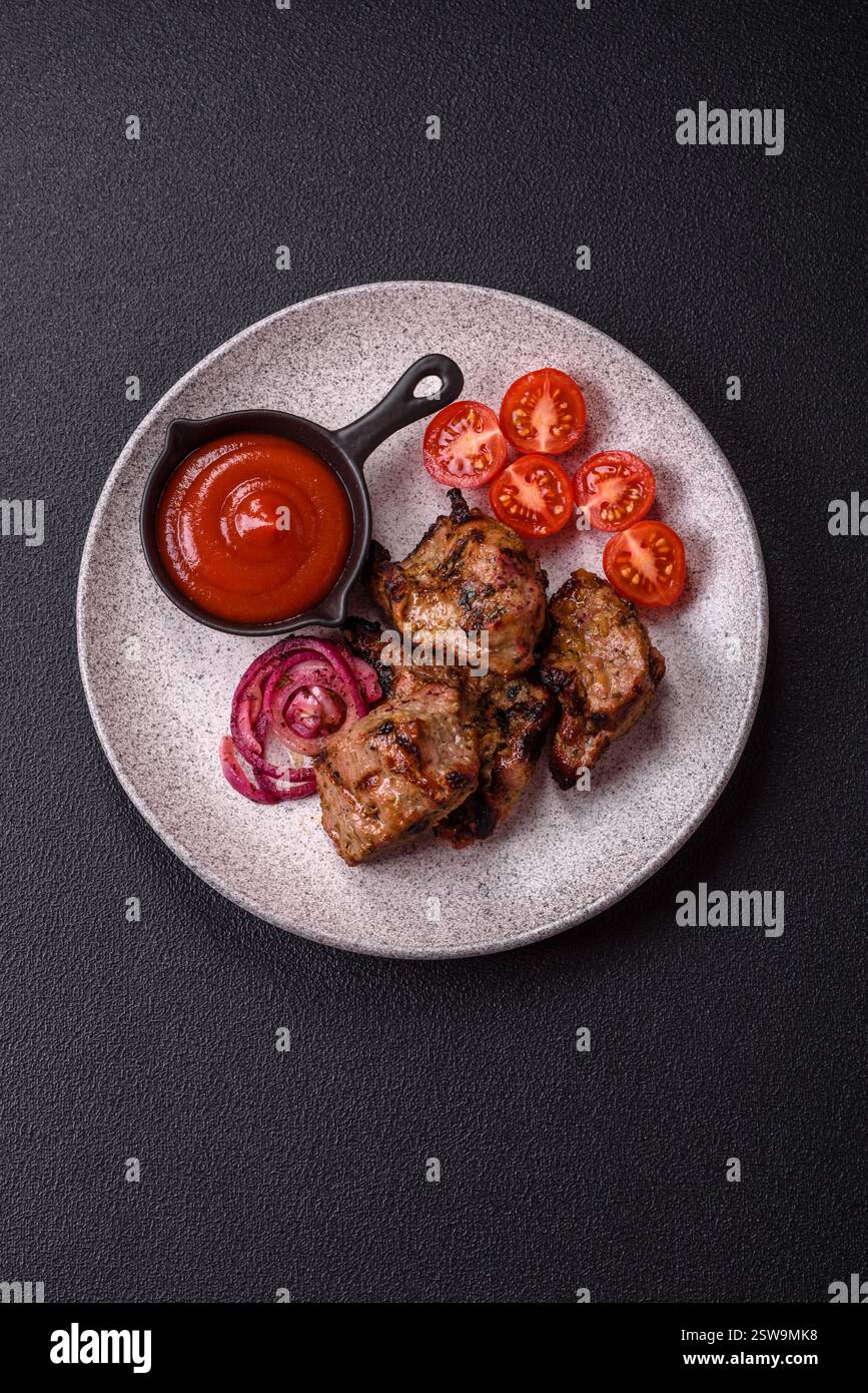 Pieces of beef meat cut into slices, marinated with salt and spices ...