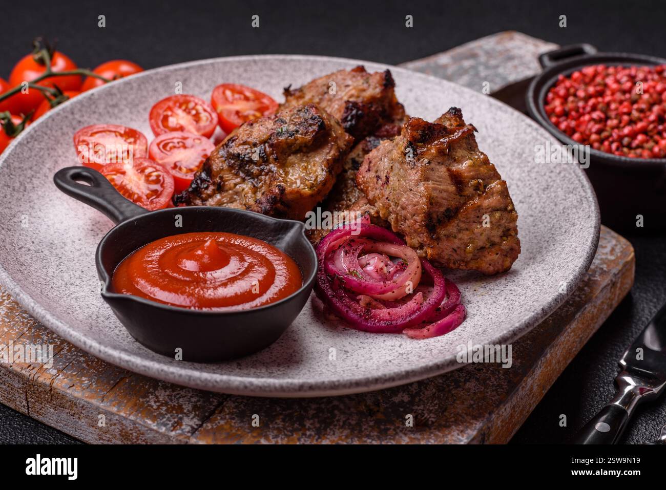 Pieces of beef meat cut into slices, marinated with salt and spices ...