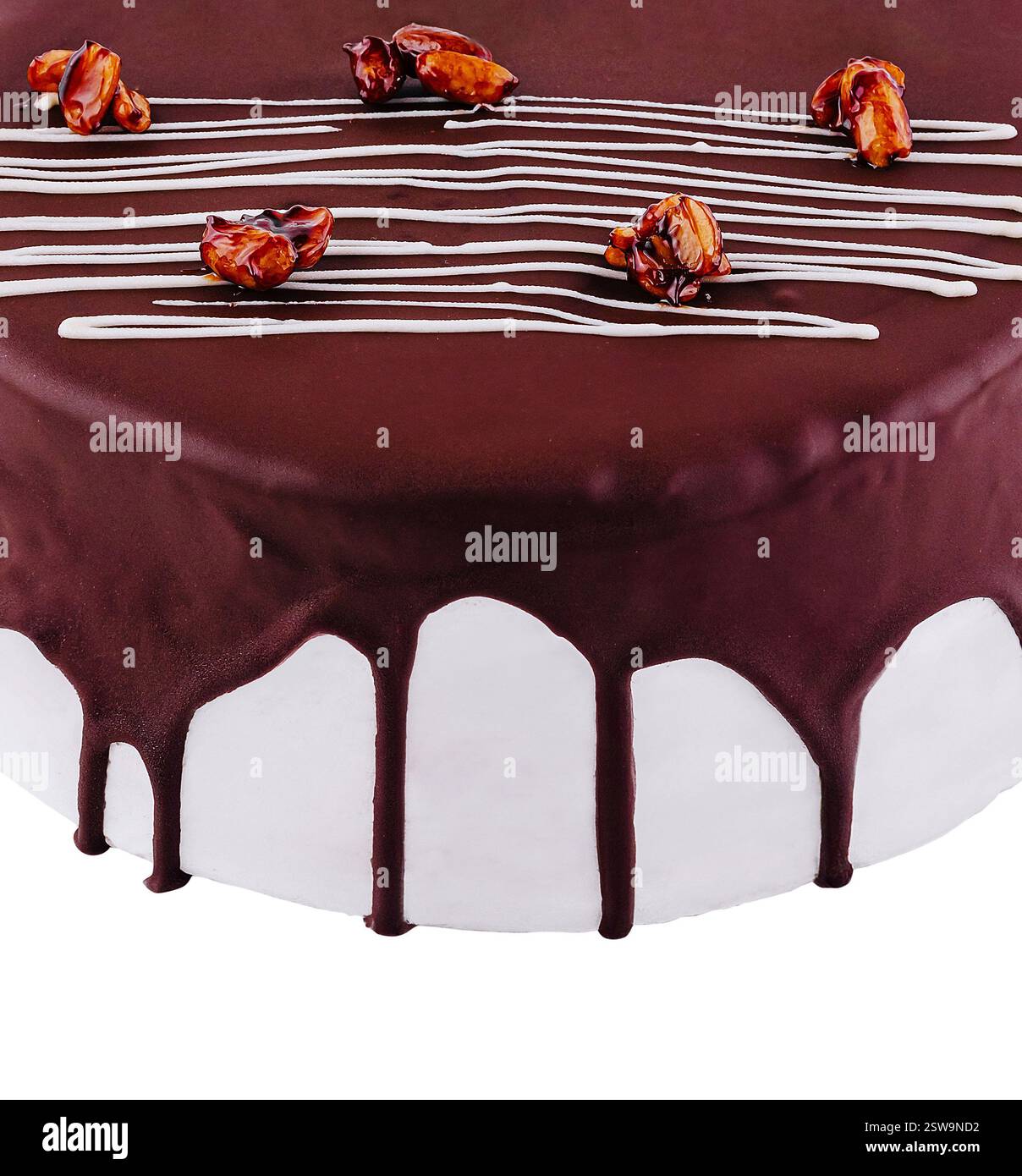 Chocolate cake with nuts dripping icing on white background Stock Photo ...