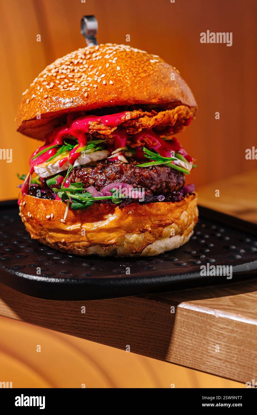 Gourmet veggie burger on stylish tray Stock Photo - Alamy