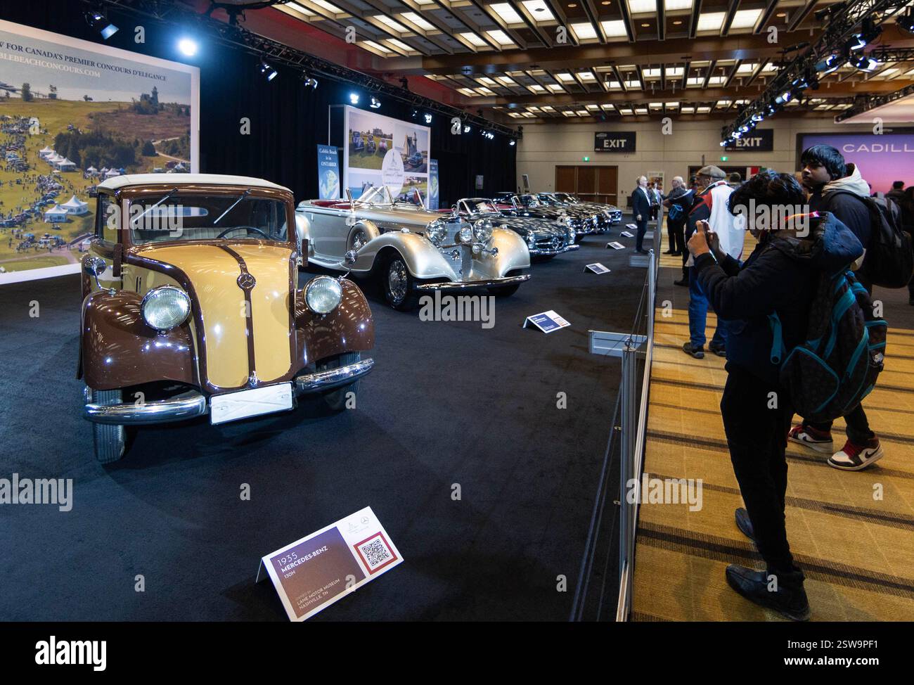 Toronto, Canada. 20th Feb, 2025. A man films a 1935 Mercedes-Benz 130H ...