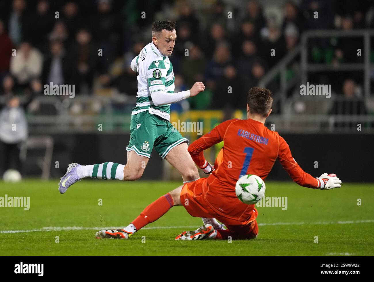 Shamrock Rovers' Aaron McEneff shoots past Molde goalkeeper Jacob ...