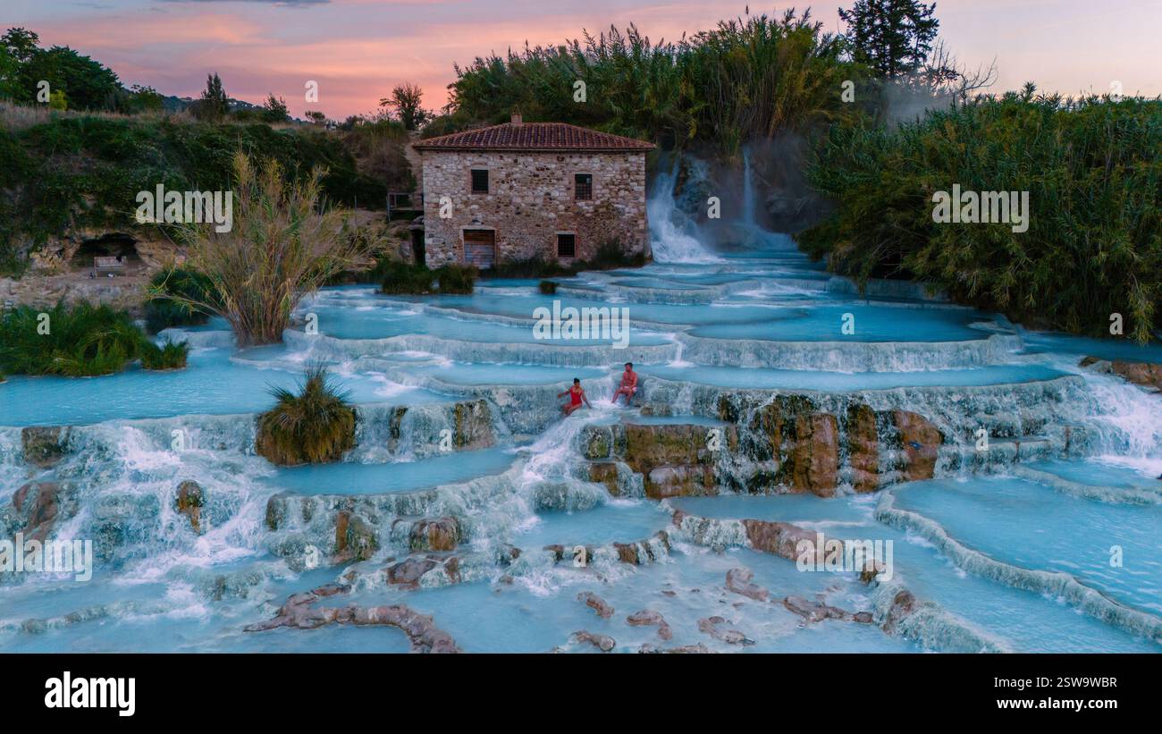 Natural thermal springs at Saturnia in Tuscany, Italy, illuminated by ...
