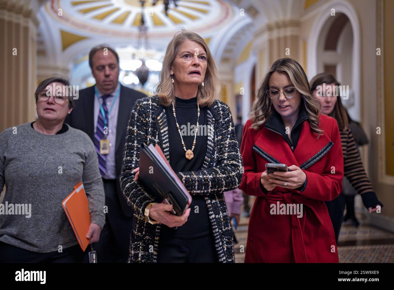 Sen. Lisa Murkowski, R-Alaska, walks to the chamber as senators gather ...