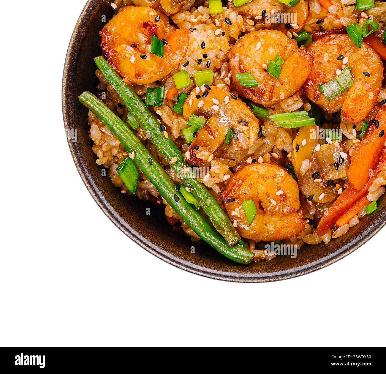 Shrimp and vegetable stir-fry rice bowl Stock Photo - Alamy