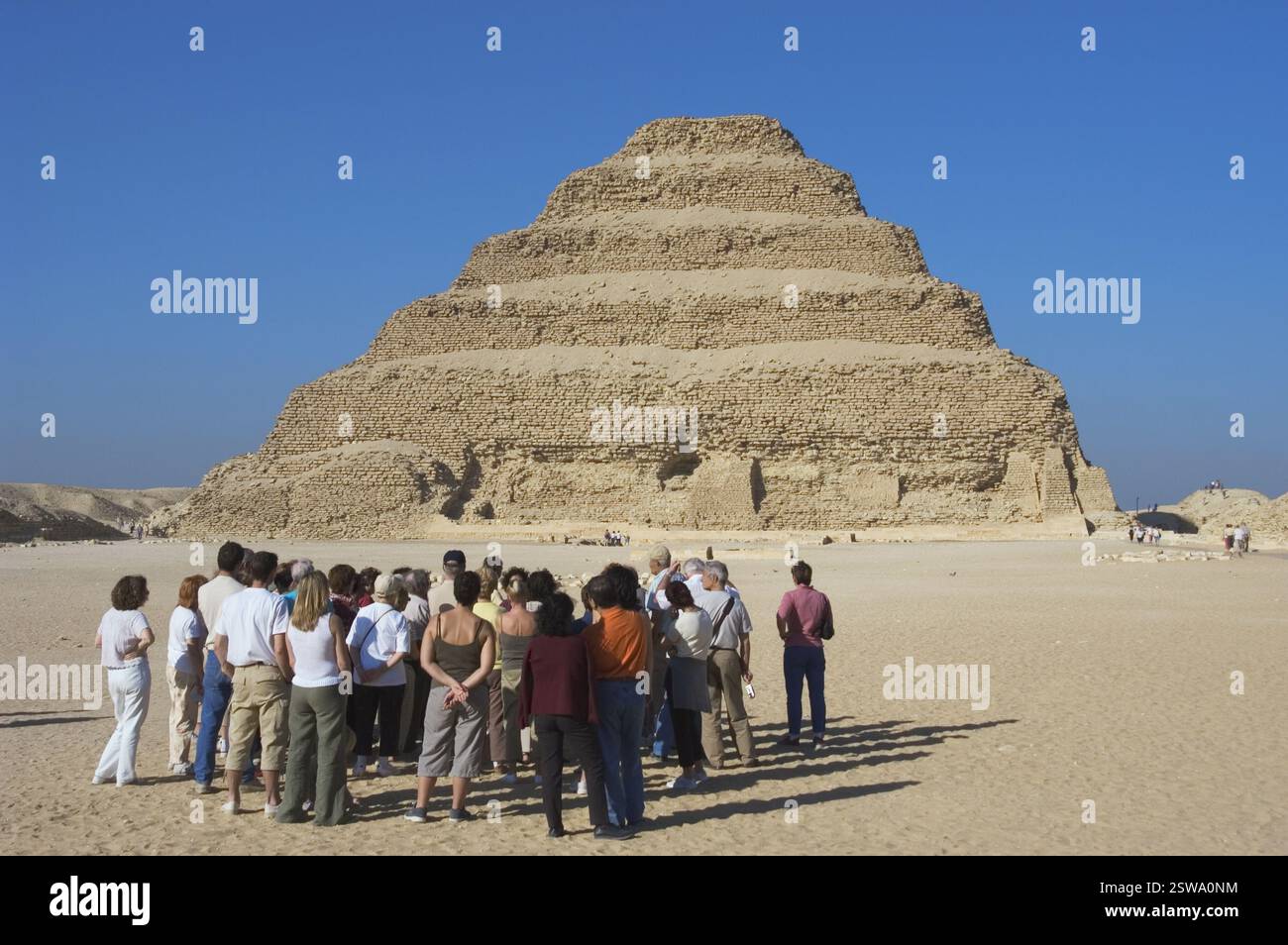 Tourists visiting the Pyramid of Djoser. Saqqara necropolis. Memphis ...