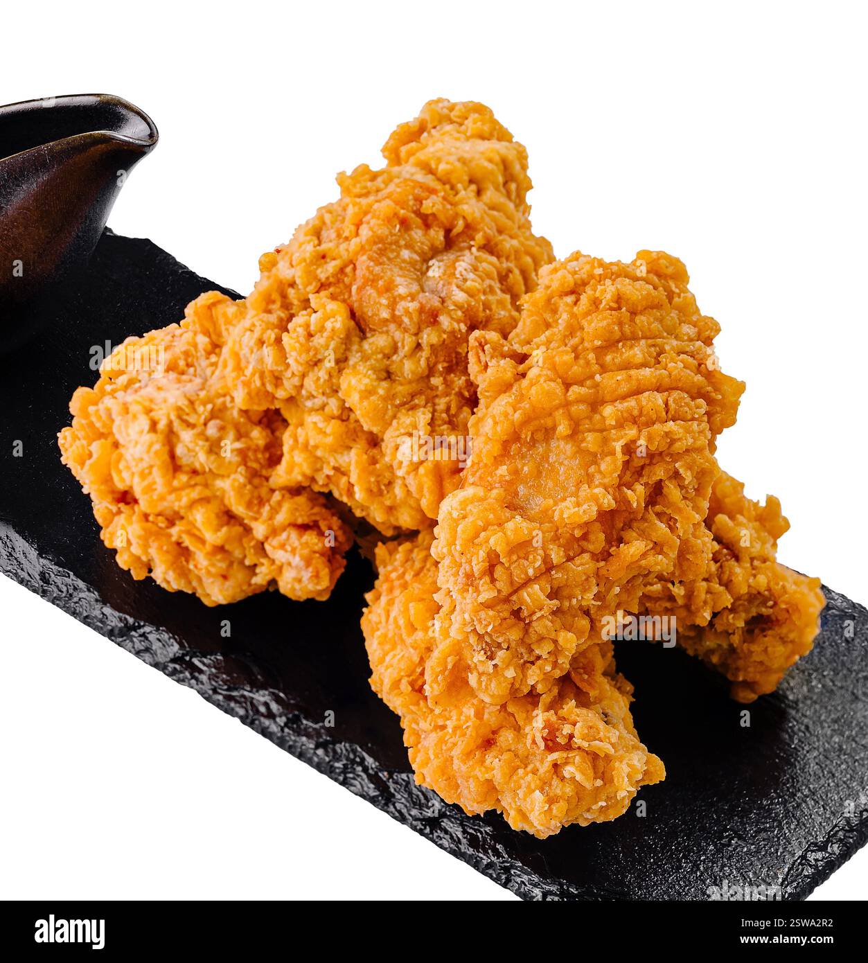 Delicious fried chicken wings being served on stone tray Stock Photo ...