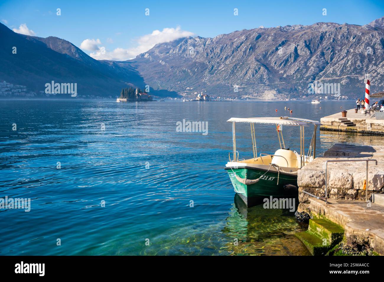 Church of Our Lady of the Rocks near Perast and fishing boat in ...