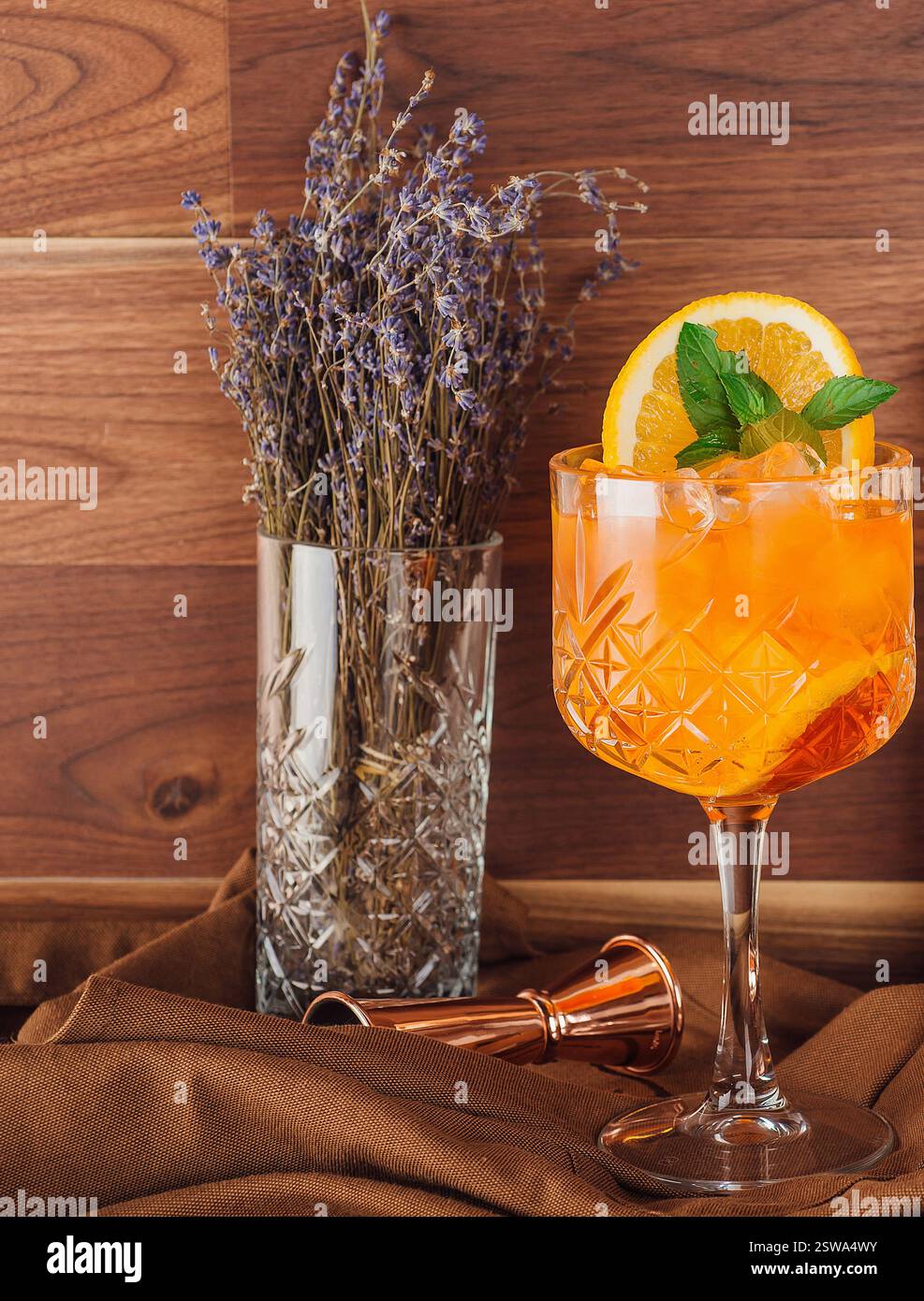 Aperol spritz cocktail is standing on the bar counter and waiting ...