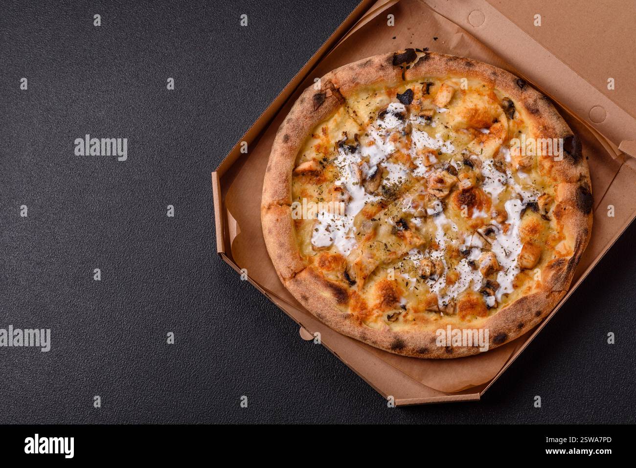 Creamy pizza with truffle cheese, mozzarella, chicken and mushrooms ...