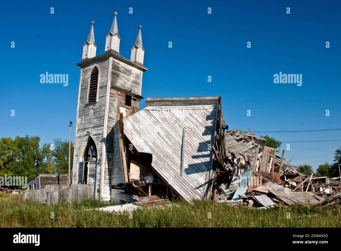 Church has been destroyed and is now a pile of rubble. The sky is clear ...