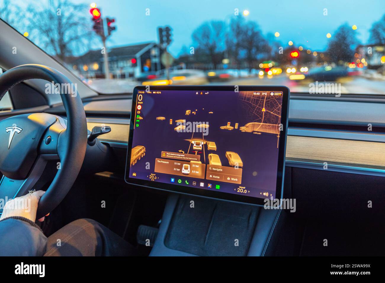 Close-up view of Tesla Model 3 interior with autopilot visualization on ...