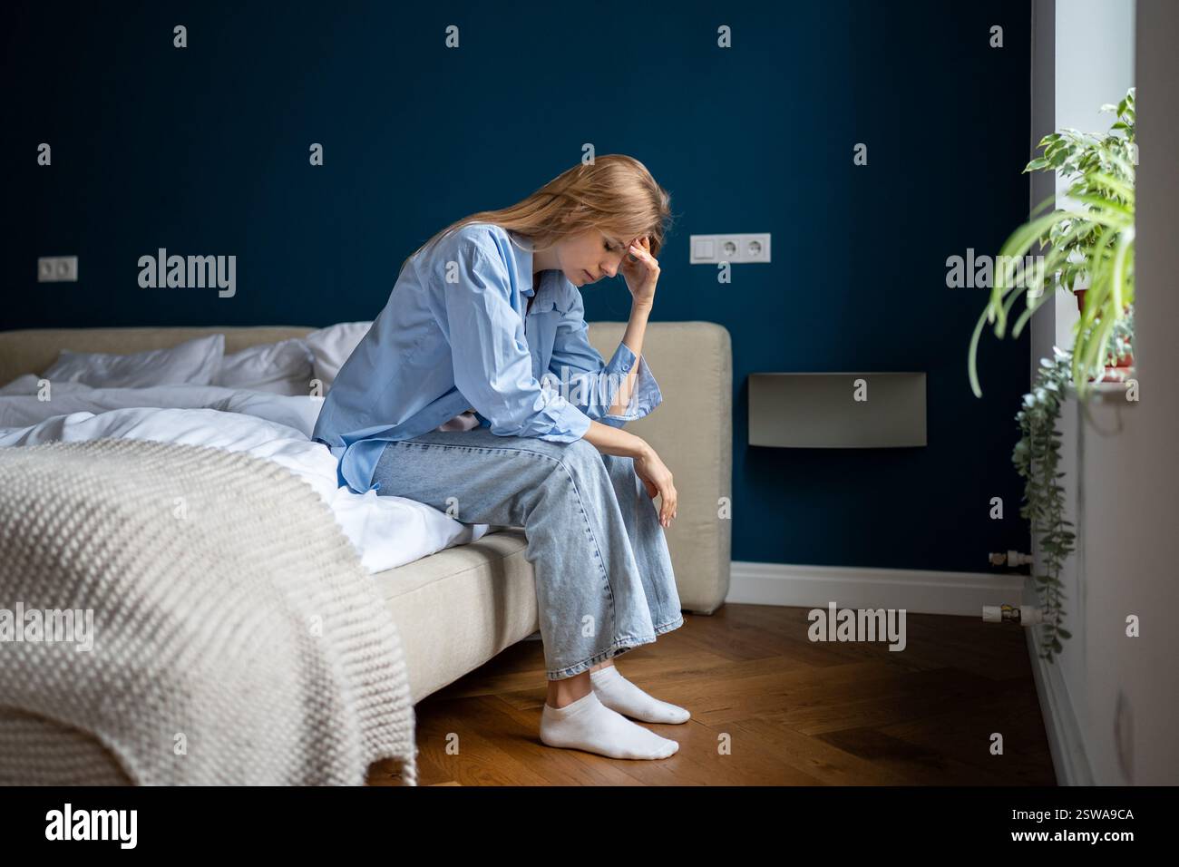 Exhausted girl thinking of psychological problem need help hi-res stock ...
